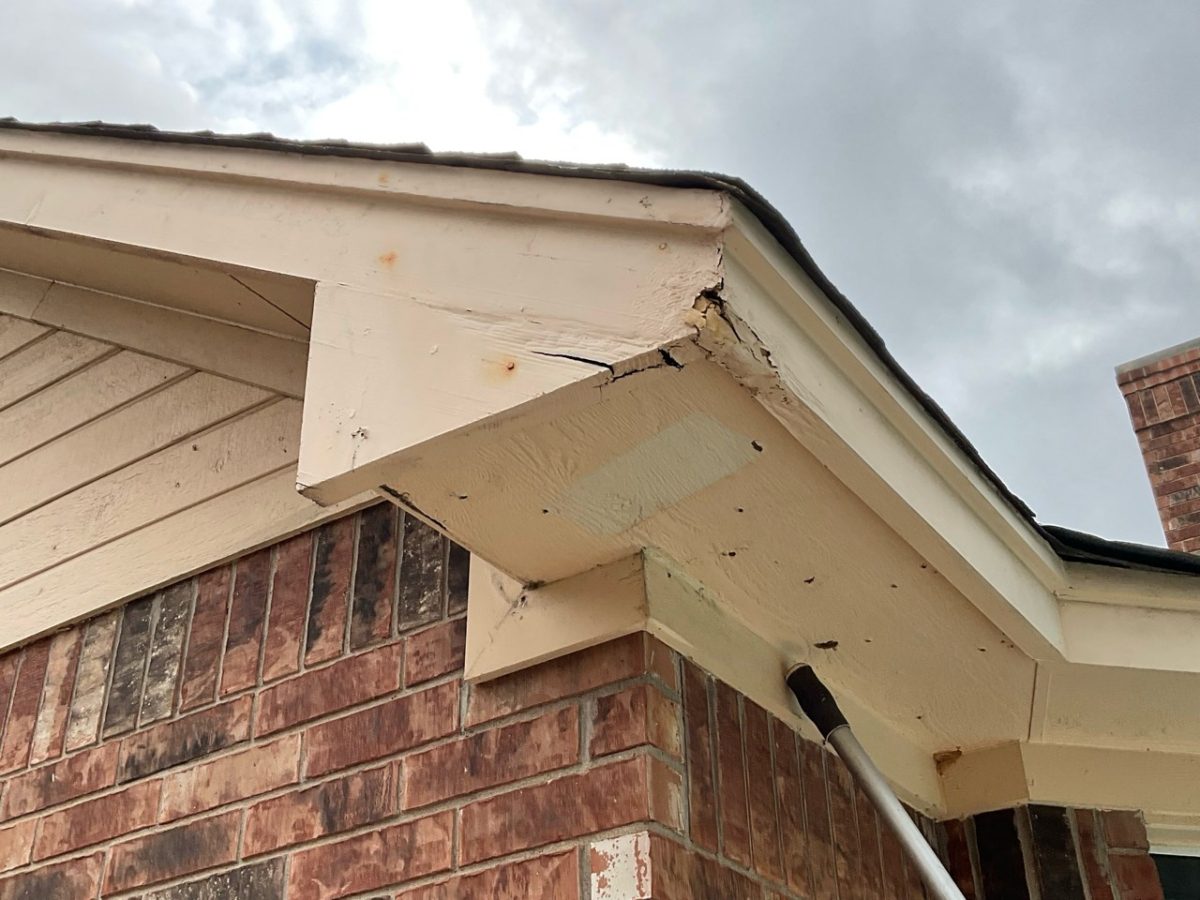 Red Brick House With Gray Siding and Dark Trim - SurePRO Painting